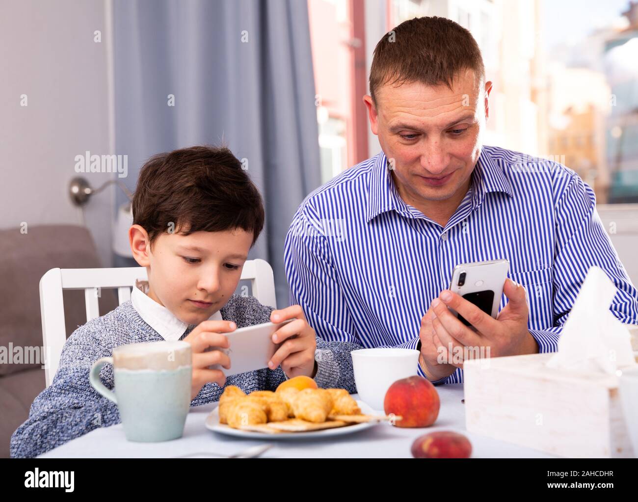Father reading with son preteen hi-res stock photography and images - Alamy