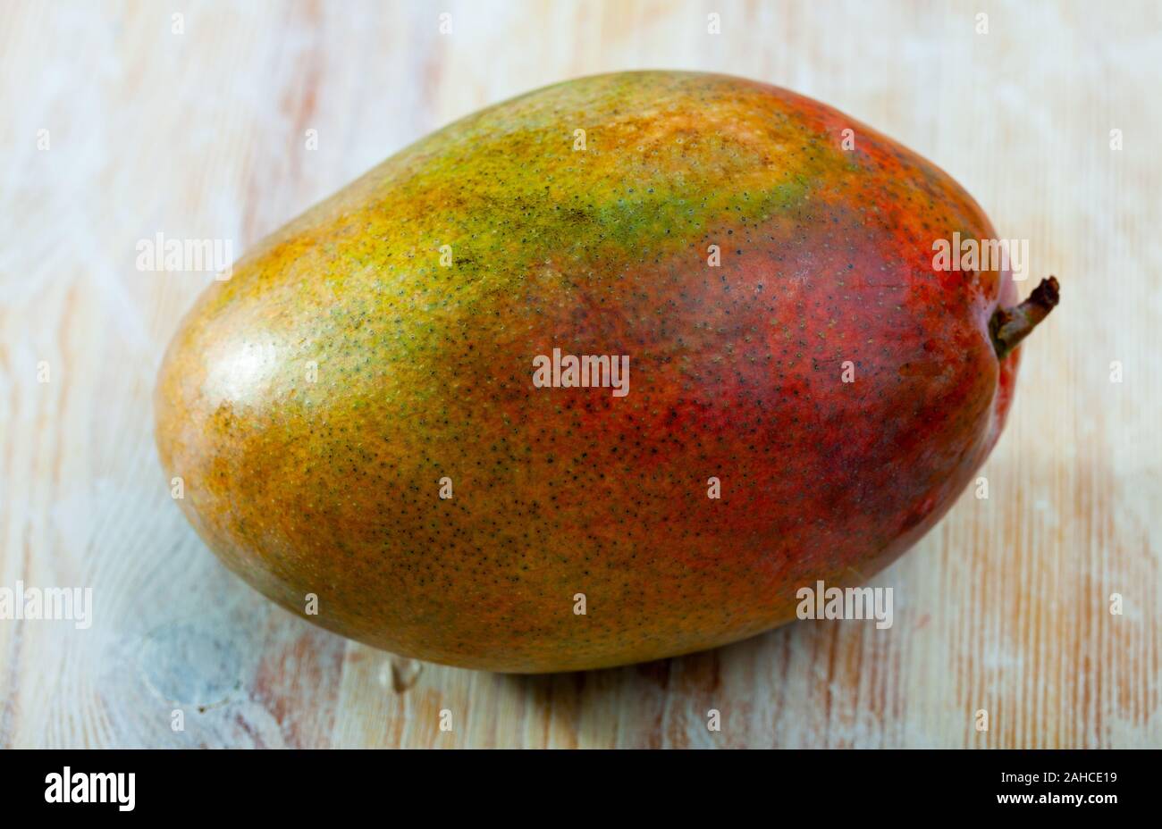 Unpeeled mango hi-res stock photography and images - Alamy