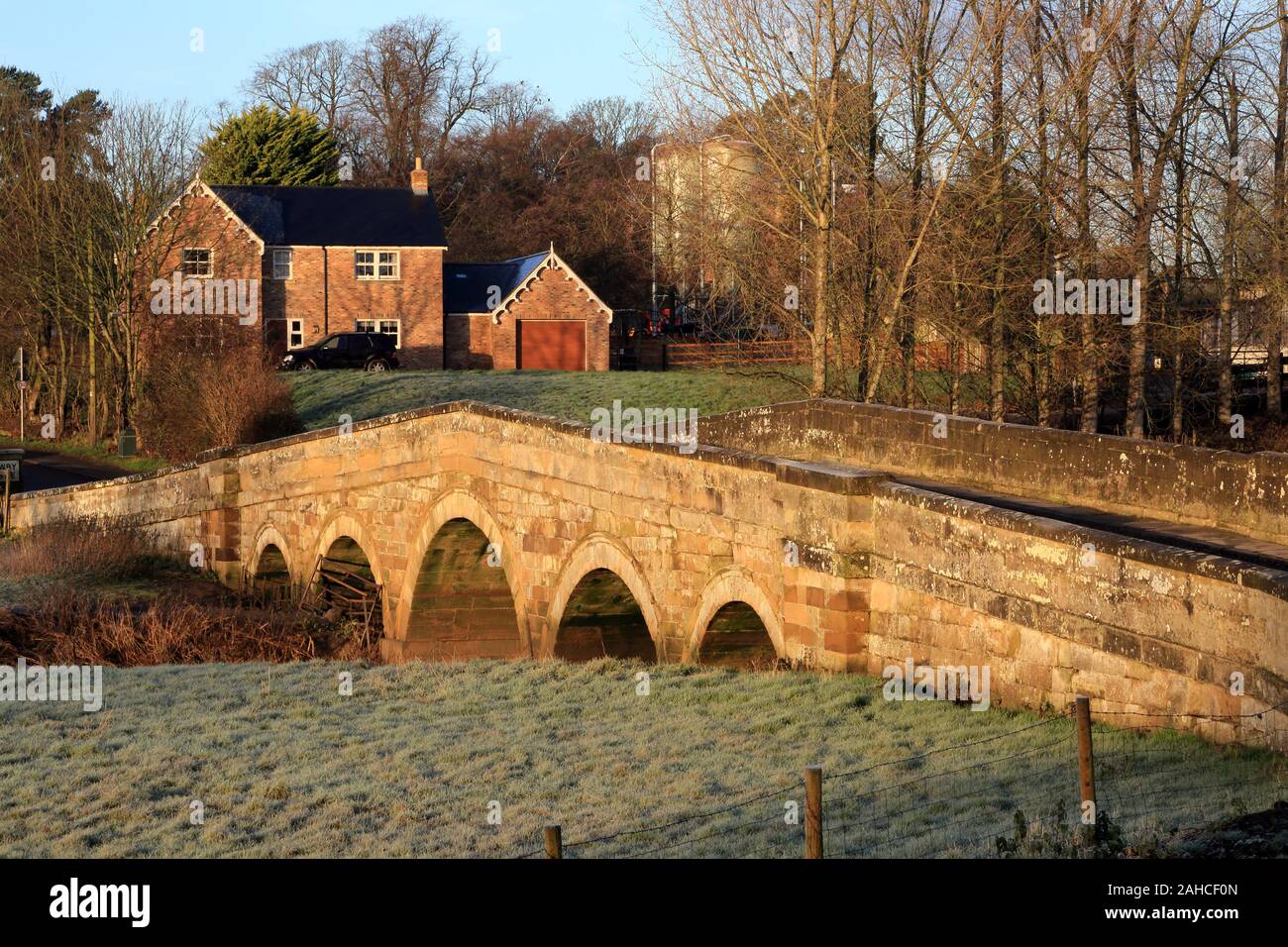 Stone bridge over River Whiske at South Otterington looking towards ...