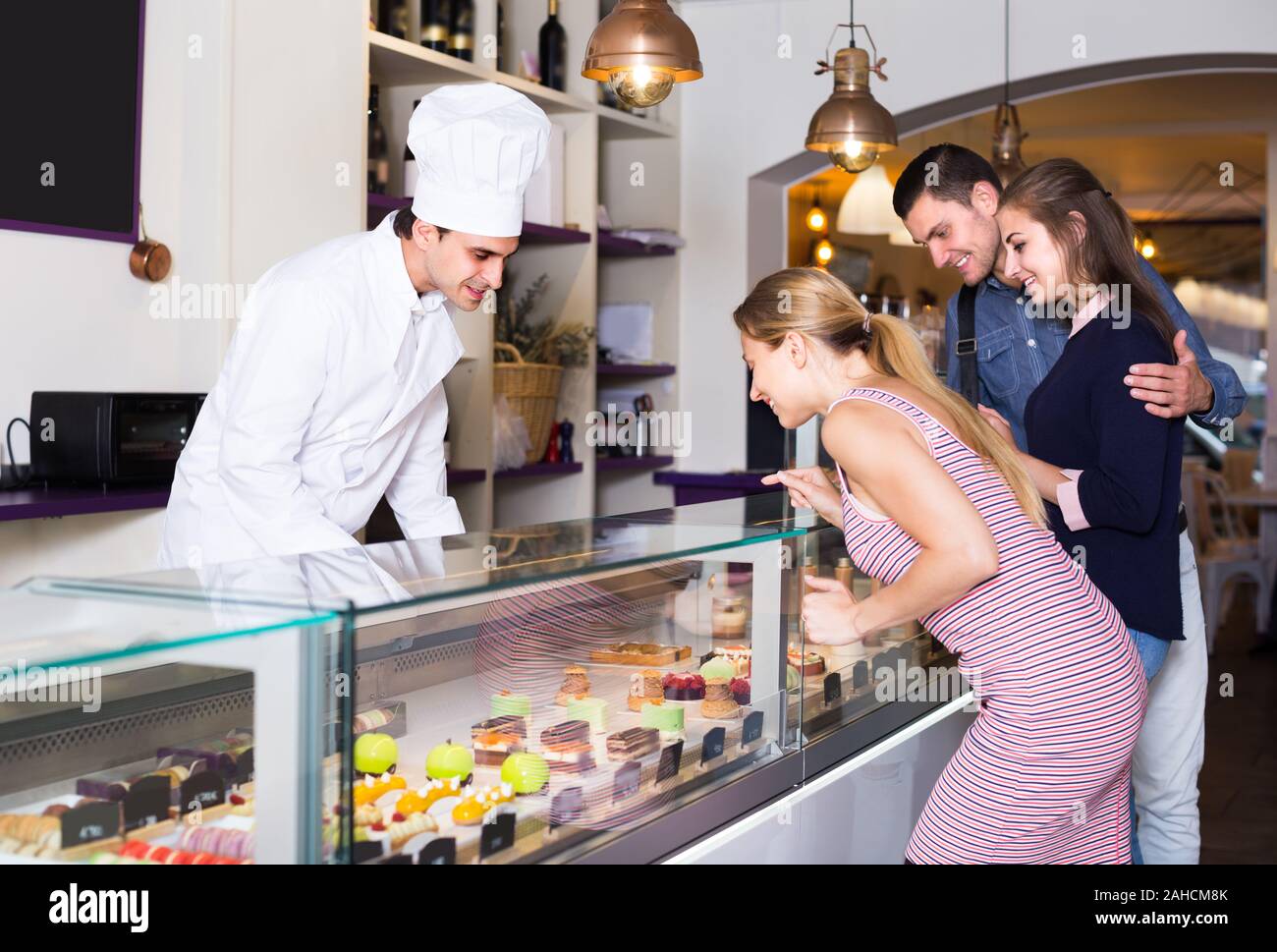 Serving client confectionery hi-res stock photography and images - Alamy