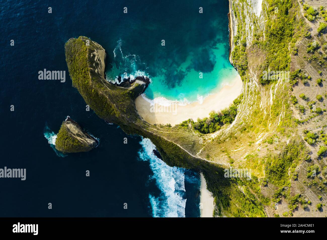 View from above, stunning aerial view of a T-Rex shaped cliffs with the ...