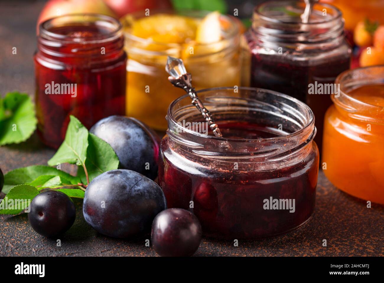Assortment of different jams in jars Stock Photo - Alamy