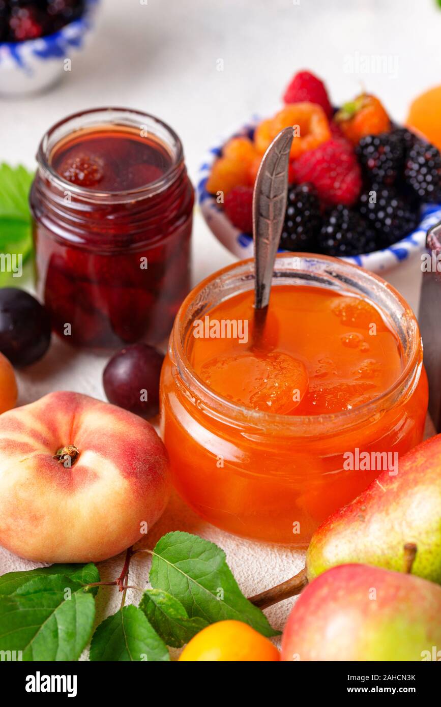 Assortment of different jams in jars Stock Photo - Alamy
