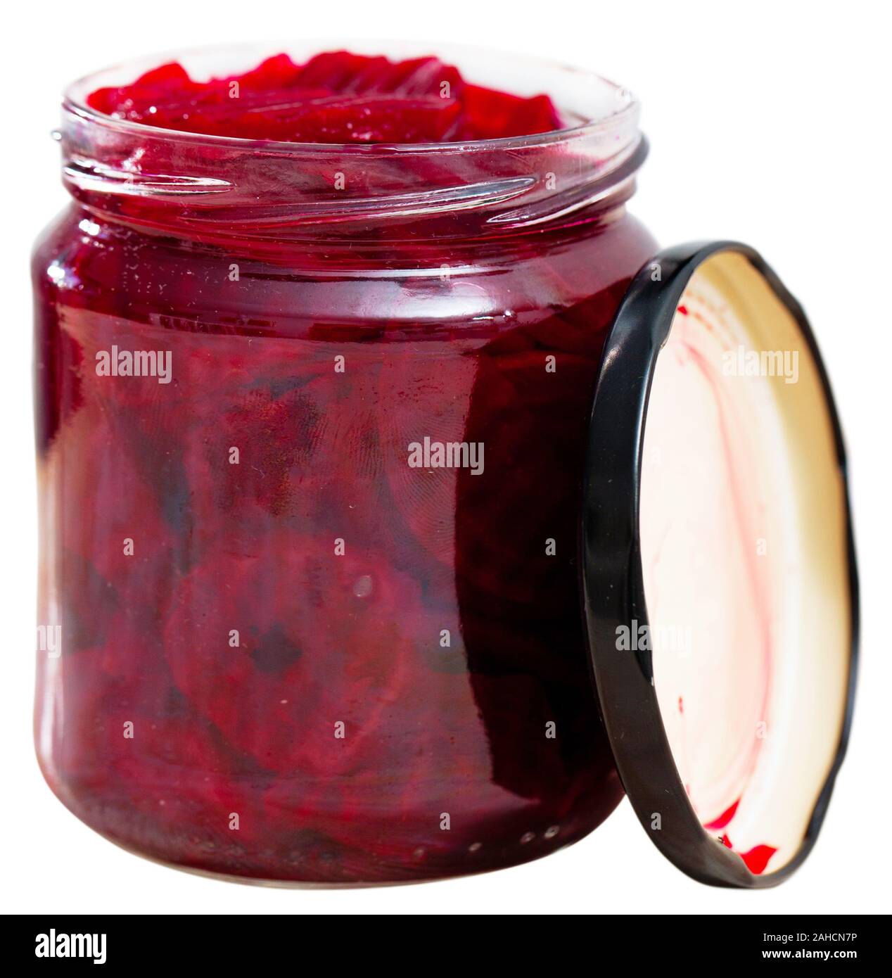 Glass jar with pickled red beets. Isolated over white background Stock ...