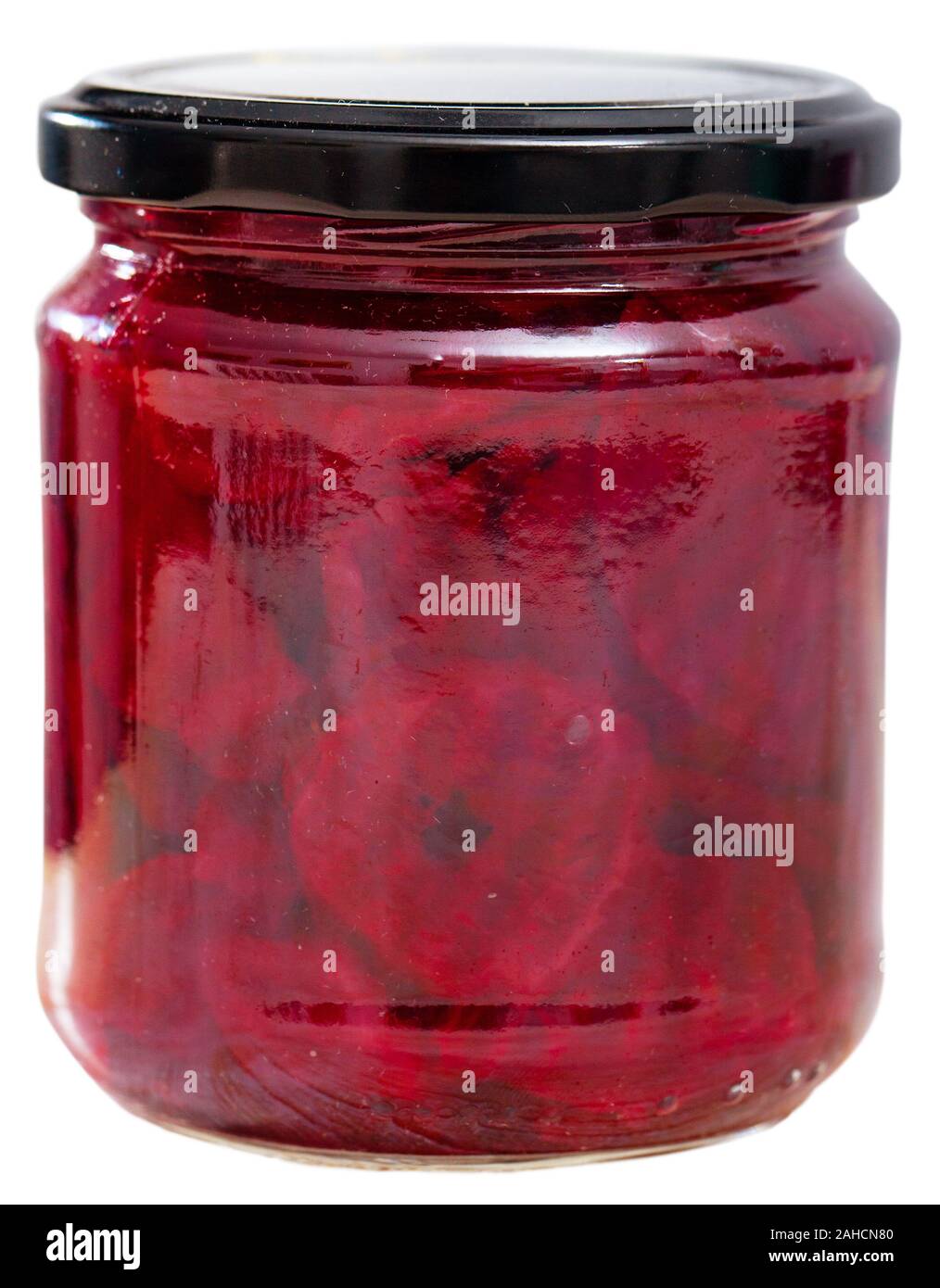 Glass jar with pickled red beets. Isolated over white background Stock ...