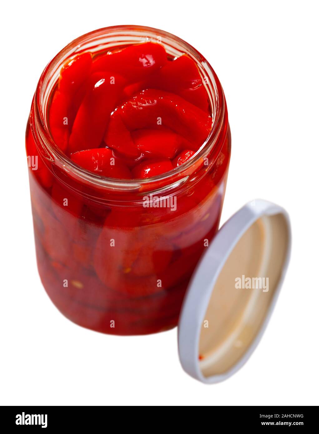 Jar of canned red bell peppers pimiento. Isolated over white background ...
