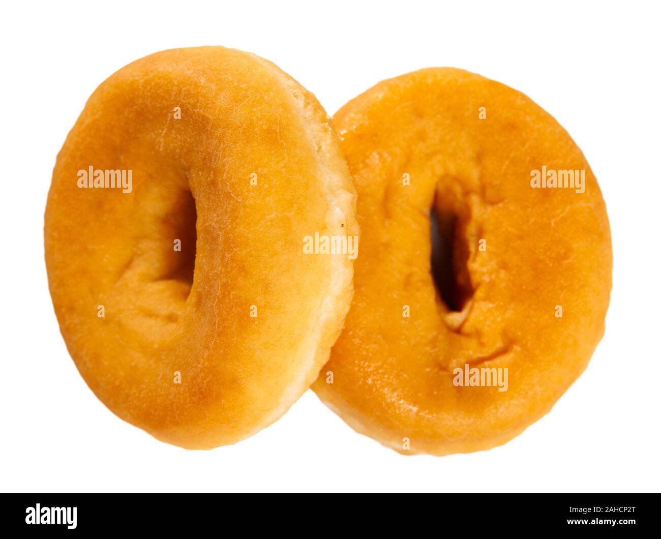 Pastries concept, sweet donuts without glaze. Isolated over white ...