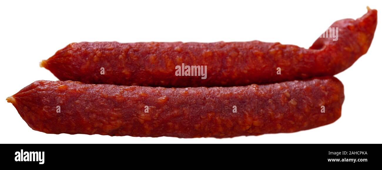 Traditional dry cured Tyrolean sausages with chilli. Isolated over ...