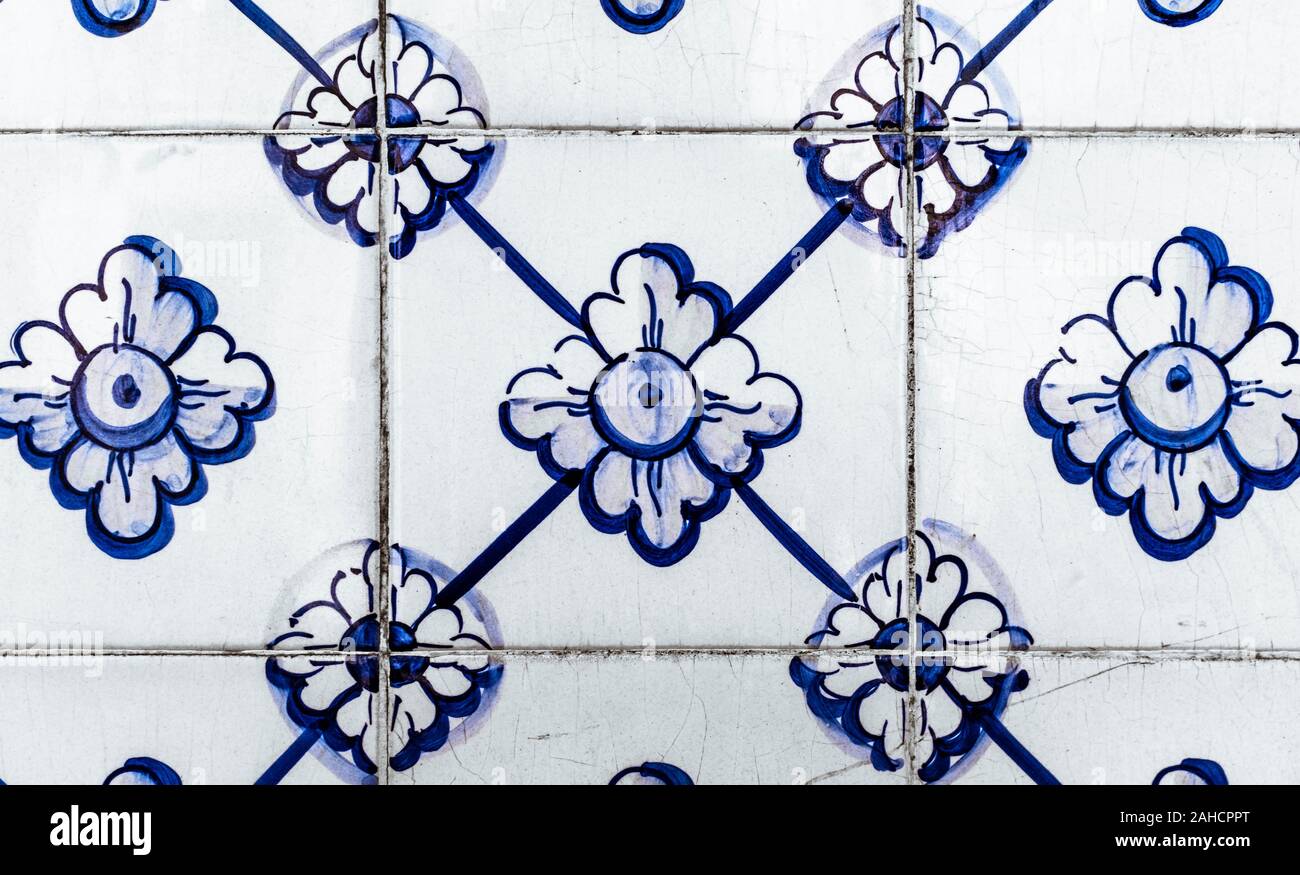 Portuguese traditional tiles Azulejos with blue floral pattern on a ...