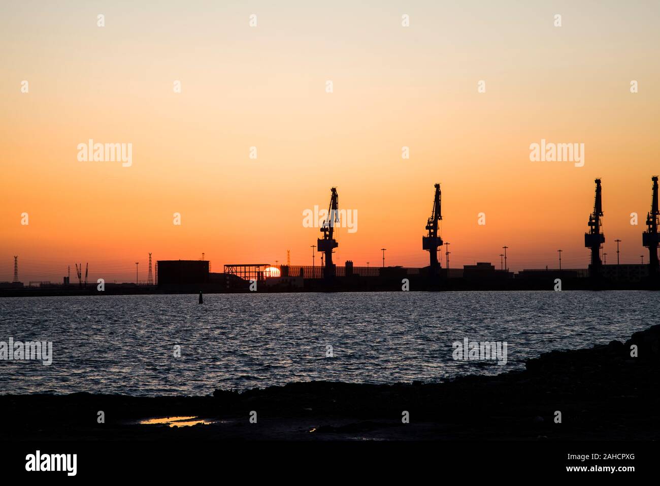 Container terminal in the evening Stock Photo - Alamy
