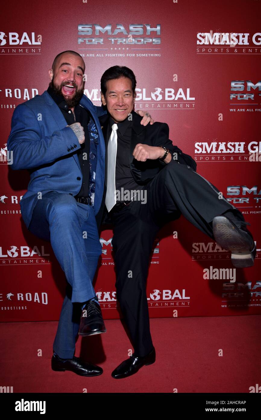 HOLLYWOOD, CA - DECEMBER 19: Taylor Ramsdell and Peter Kwong arrive for ...