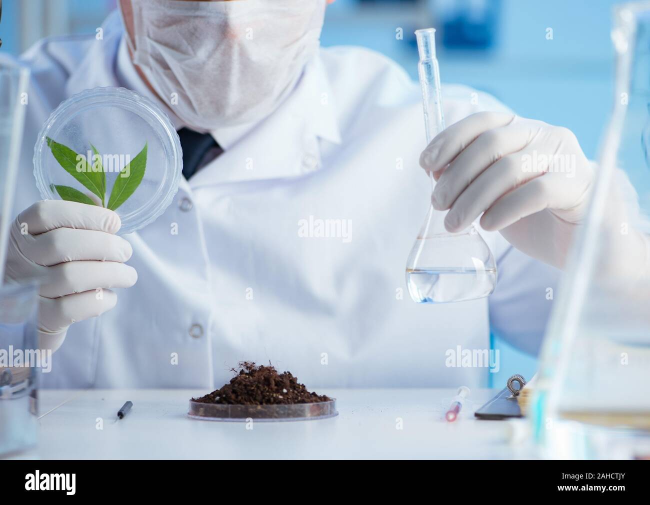 The male scientist researcher doing experiment in a laboratory Stock ...