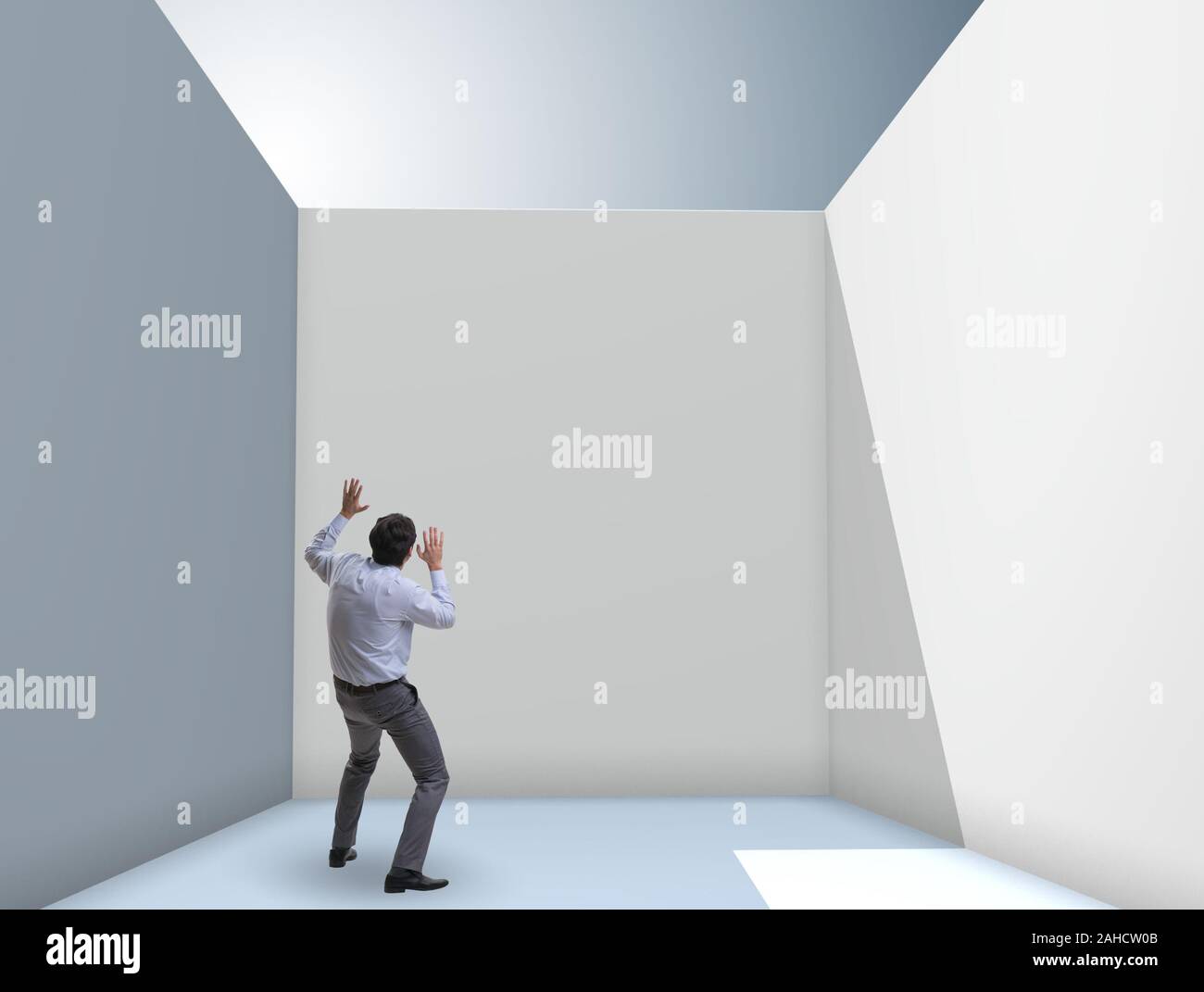 The businessman trying to escape from difficult situation Stock Photo ...