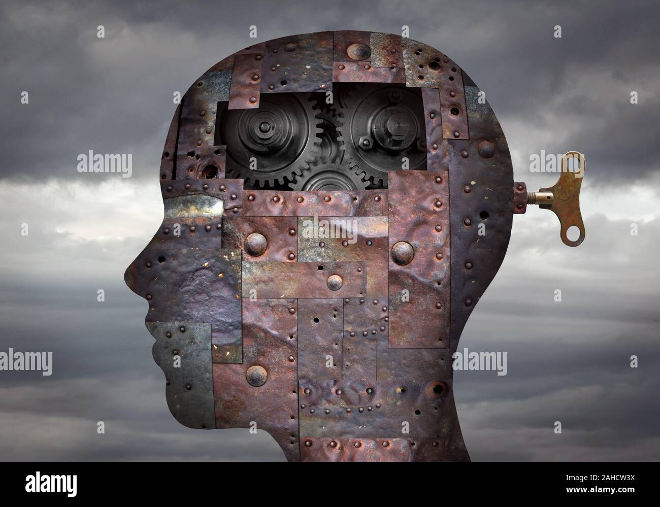 Metallic head with gear Stock Photo - Alamy