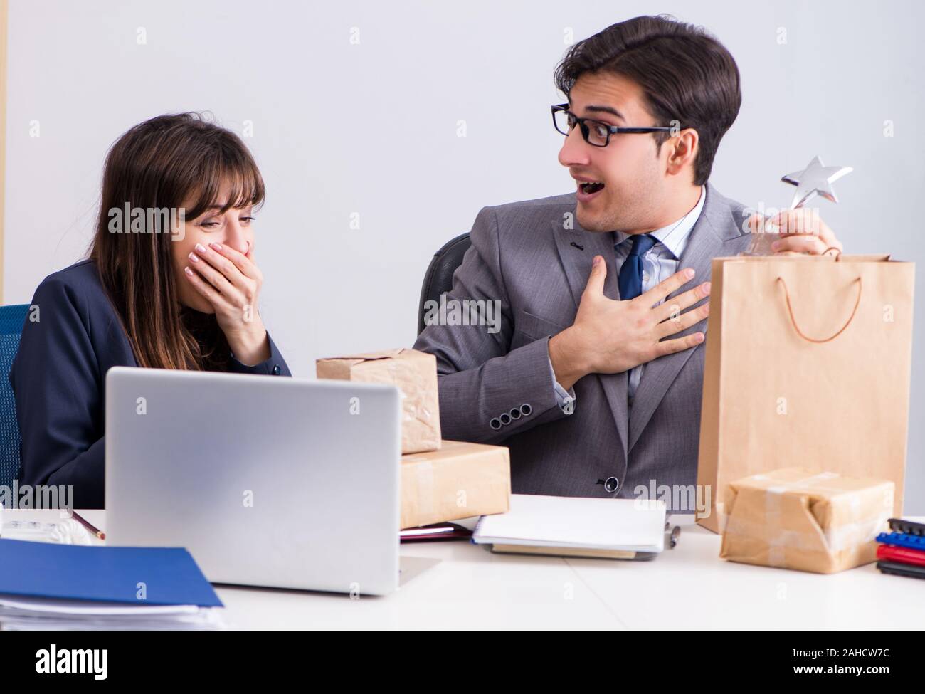 The business people receiving new mail and parcels Stock Photo - Alamy