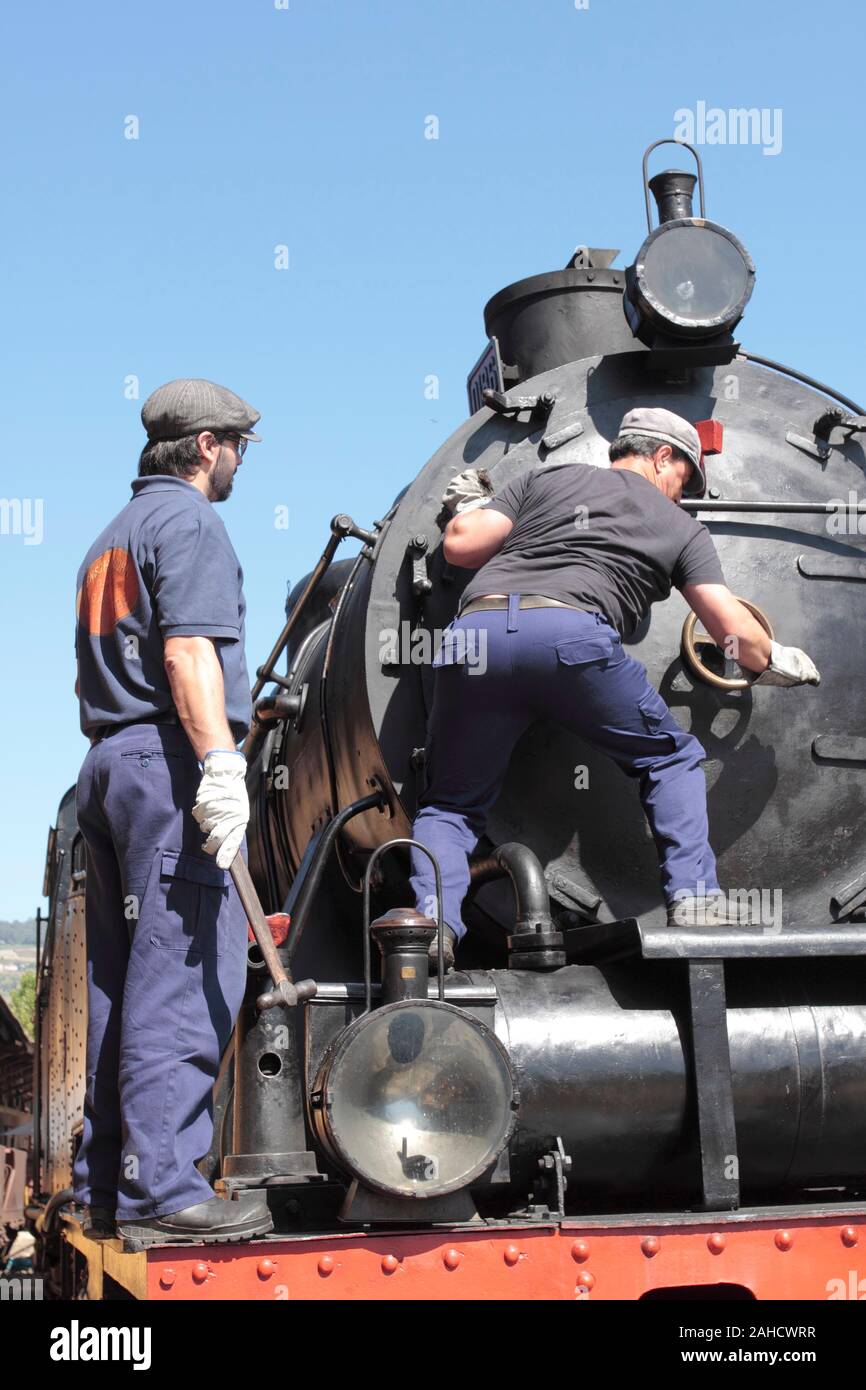 Chaves, Portugal - July 25, 2009: Old steam locomotive seeing his crew ...