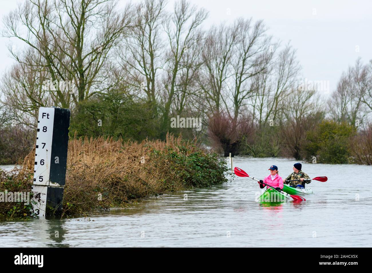 Welney, UK. 28th Dec, 2019. A1101 Canoeists sailing in the Welney Wash ...
