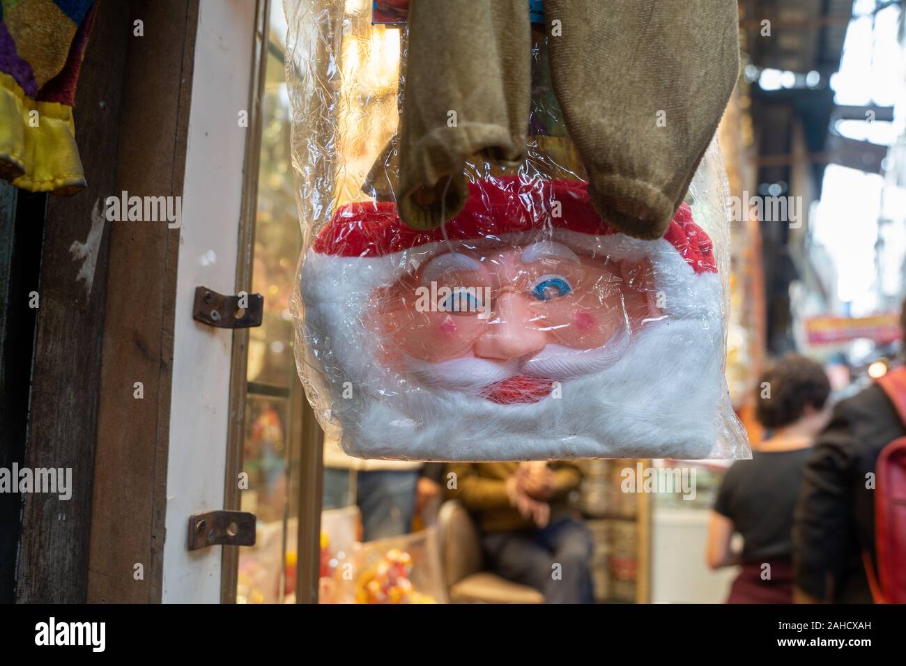 Funny looking Santa mask for sale at a market in Old Delhi India Stock ...