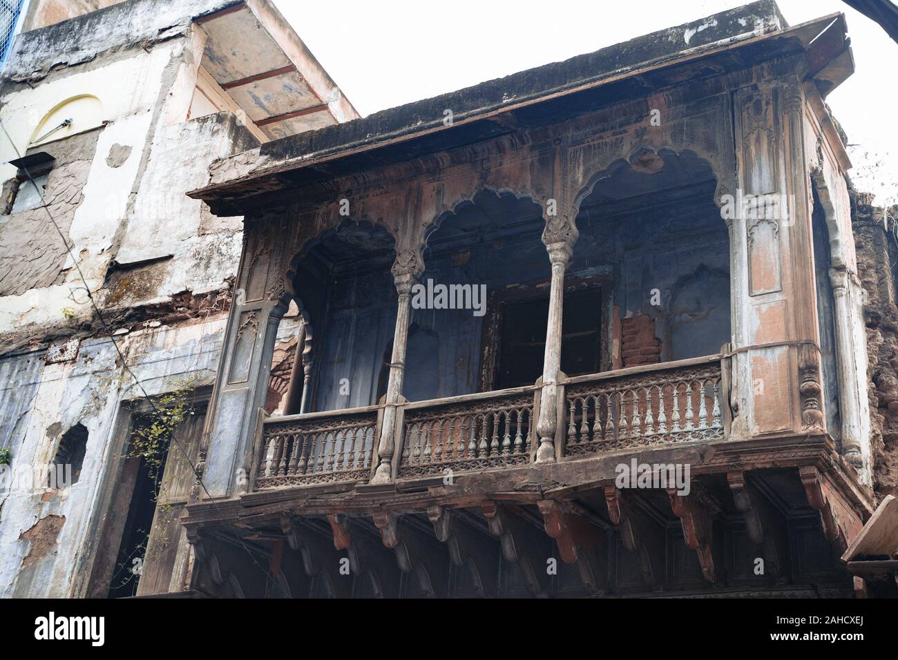 Old abandoned balcony with arches in a building in Old Delhi India ...