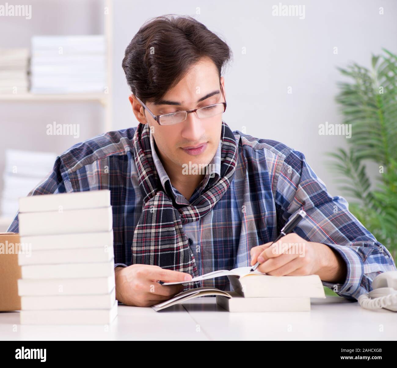 The writer presenting his books to public Stock Photo - Alamy