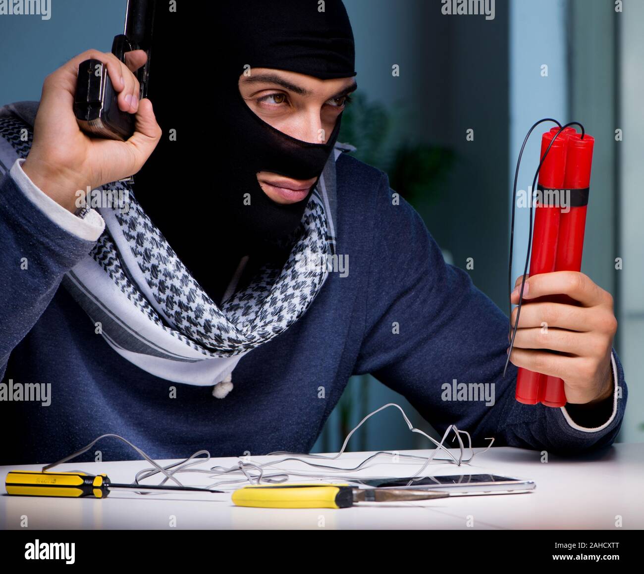 The terrorist bomber preparing dynamite bomb Stock Photo - Alamy