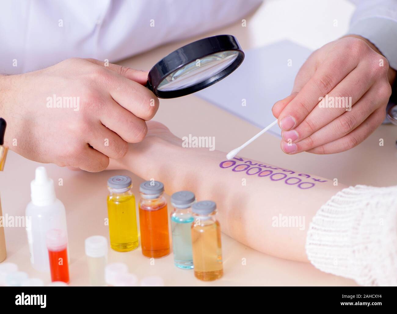 The doctor testing allergy reaction of patient in hospital Stock Photo ...