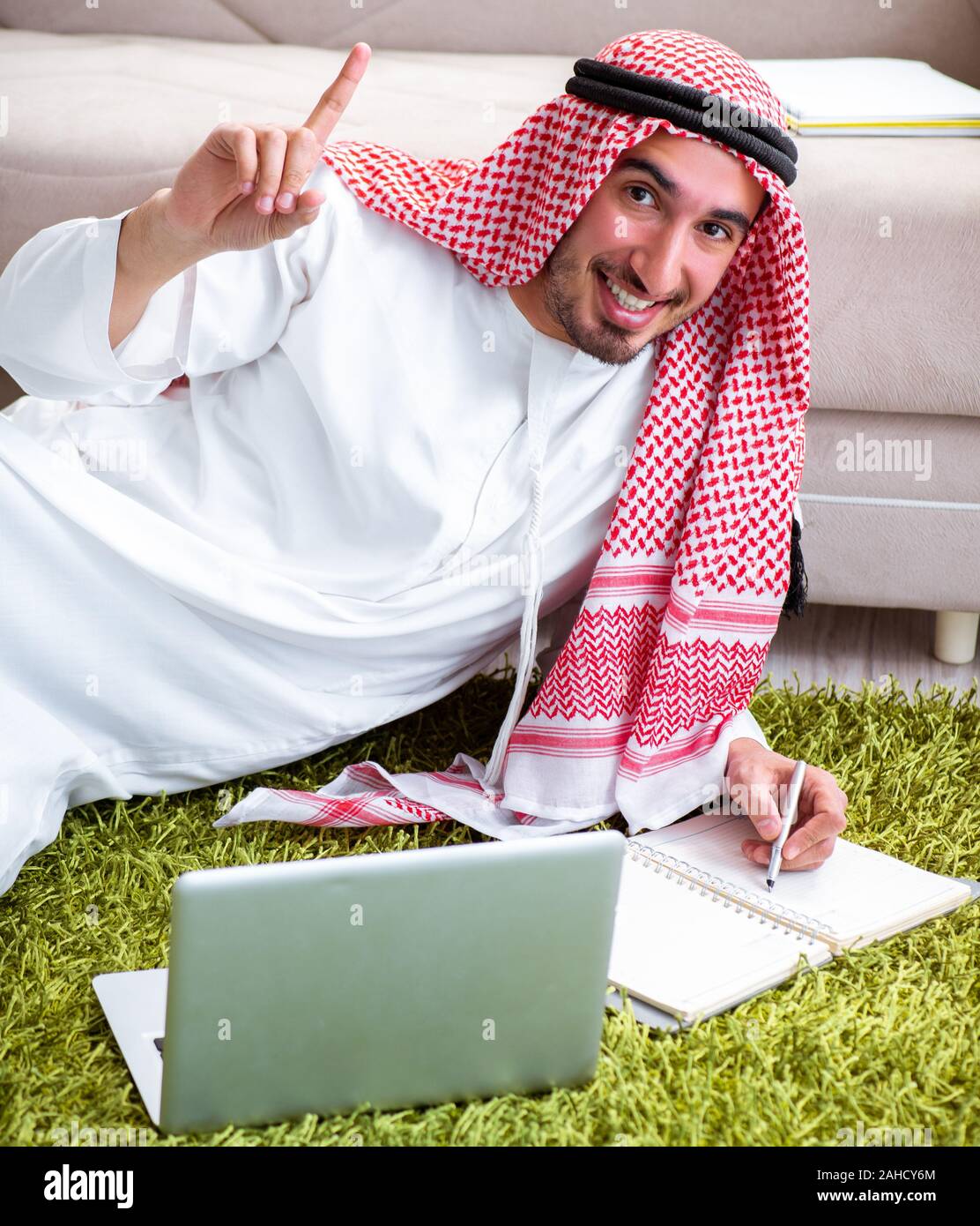 The arab man working at home on his work Stock Photo - Alamy