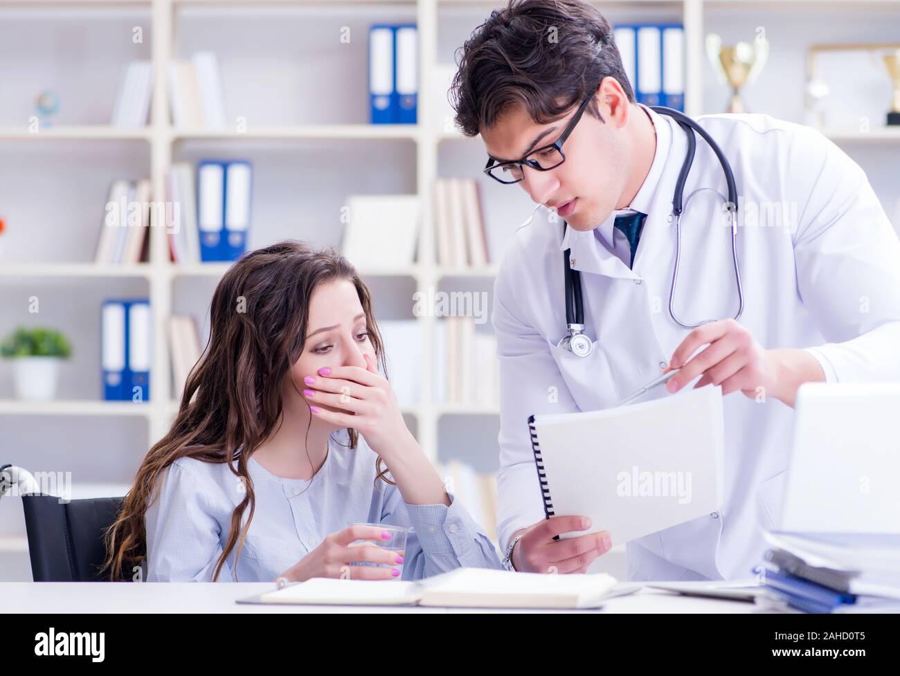 The doctor sharing discouraging lab test results to patient Stock Photo ...