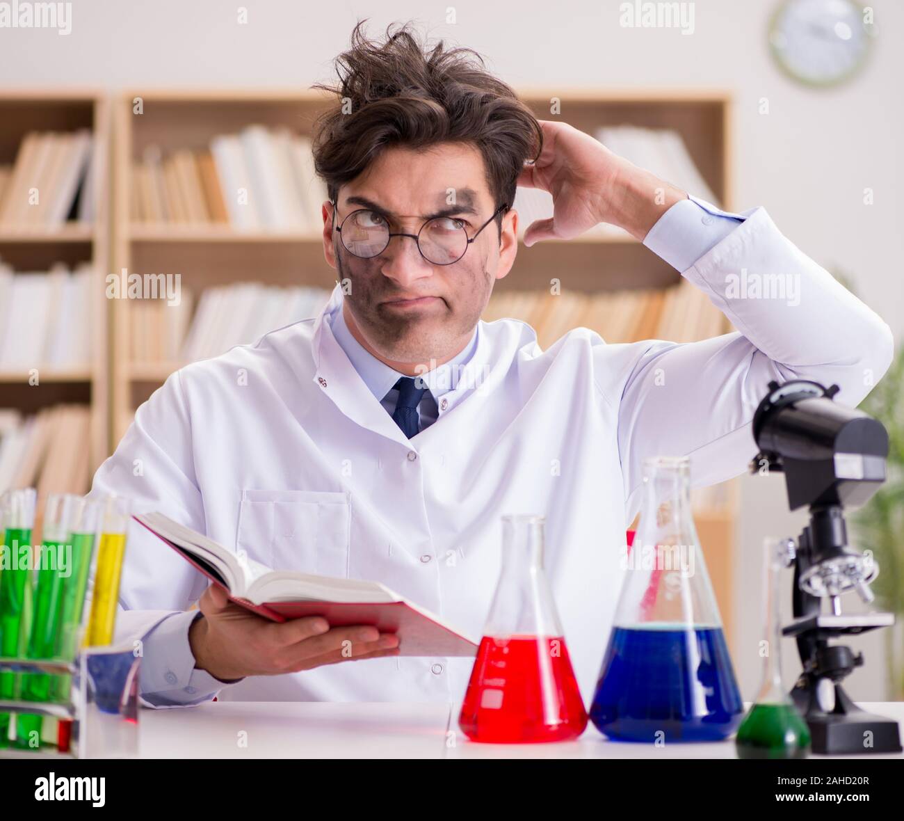 The mad crazy scientist doctor doing experiments in a laboratory Stock ...
