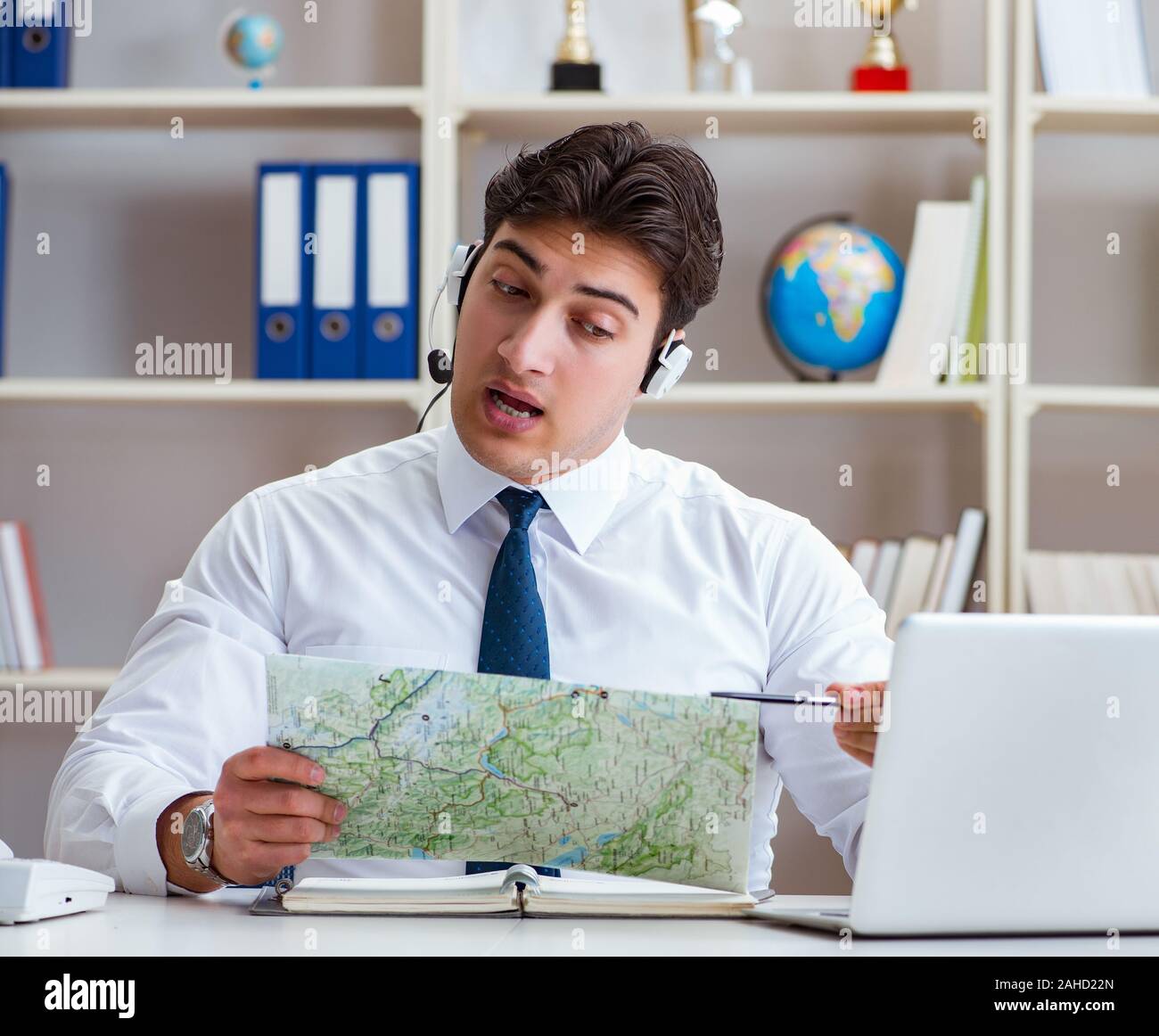 The businessman operator traveling agent working in the office Stock ...