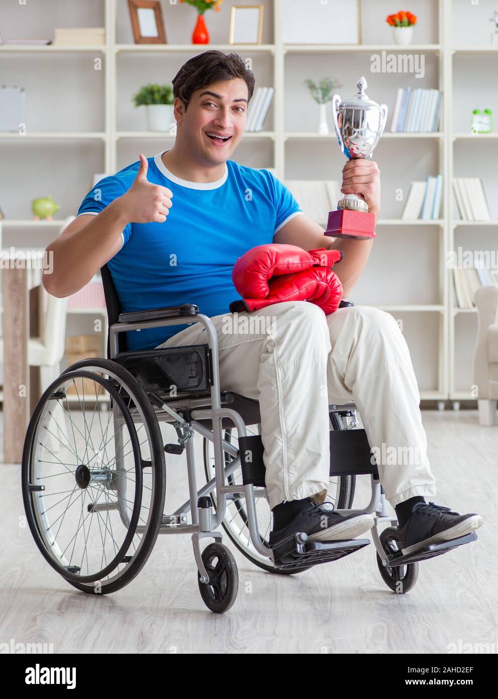 Wheelchair and boxing gloves hi-res stock photography and images - Alamy