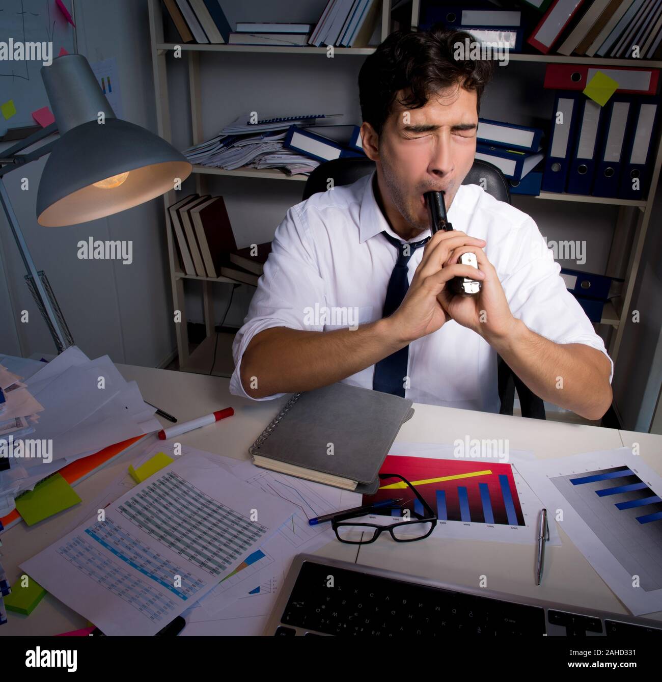 The man businessman working late hours in the office Stock Photo - Alamy