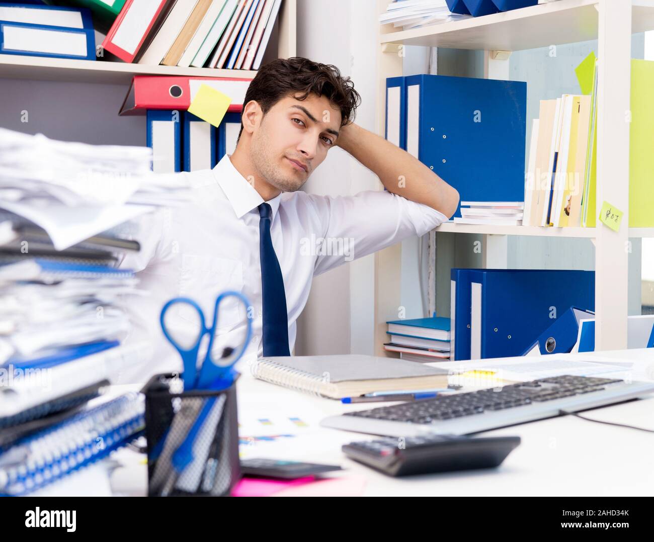 Man stressed doing paper work hi-res stock photography and images - Alamy