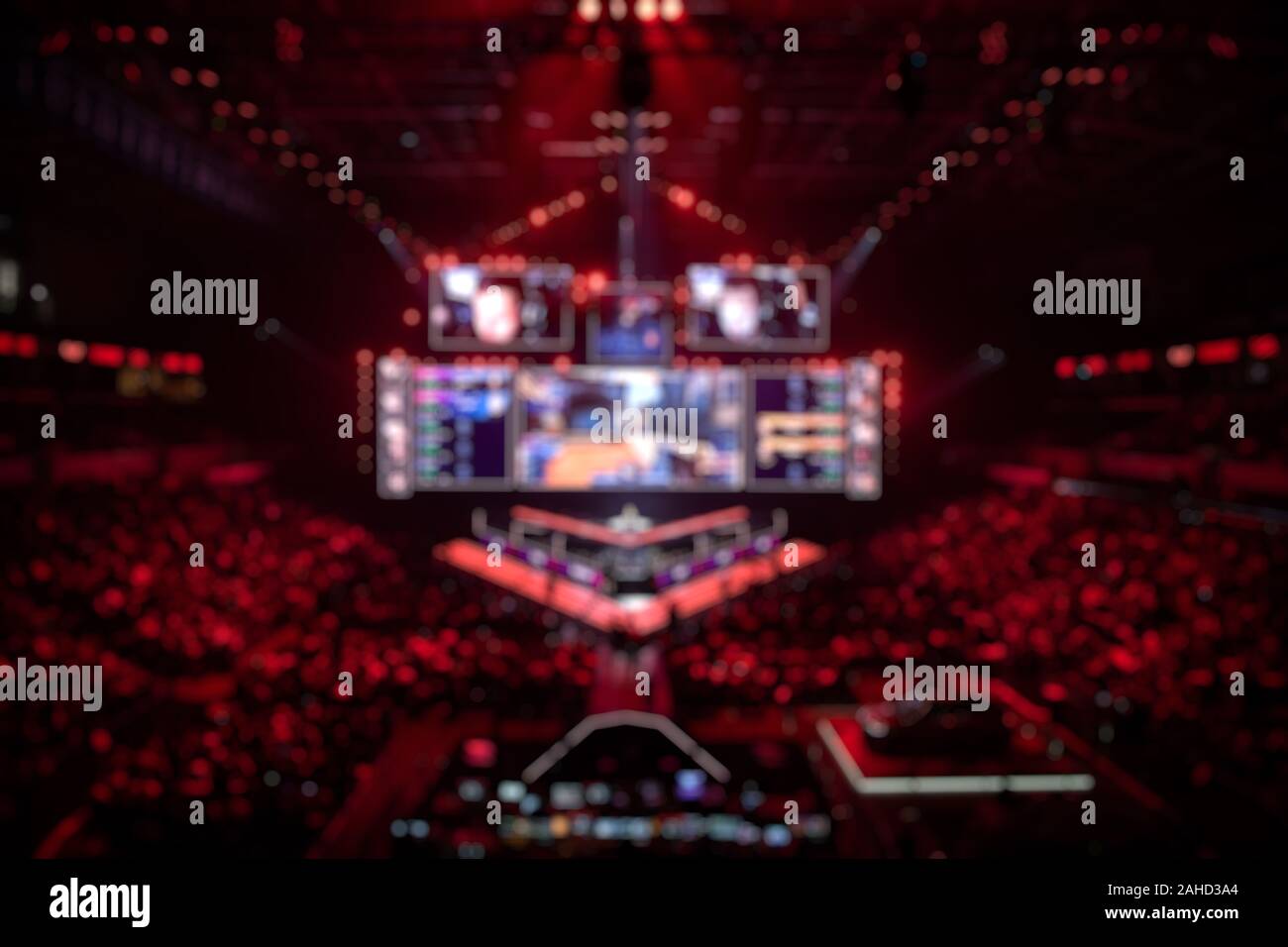 Blurred background of an esports event - Big illuminated main stage of ...