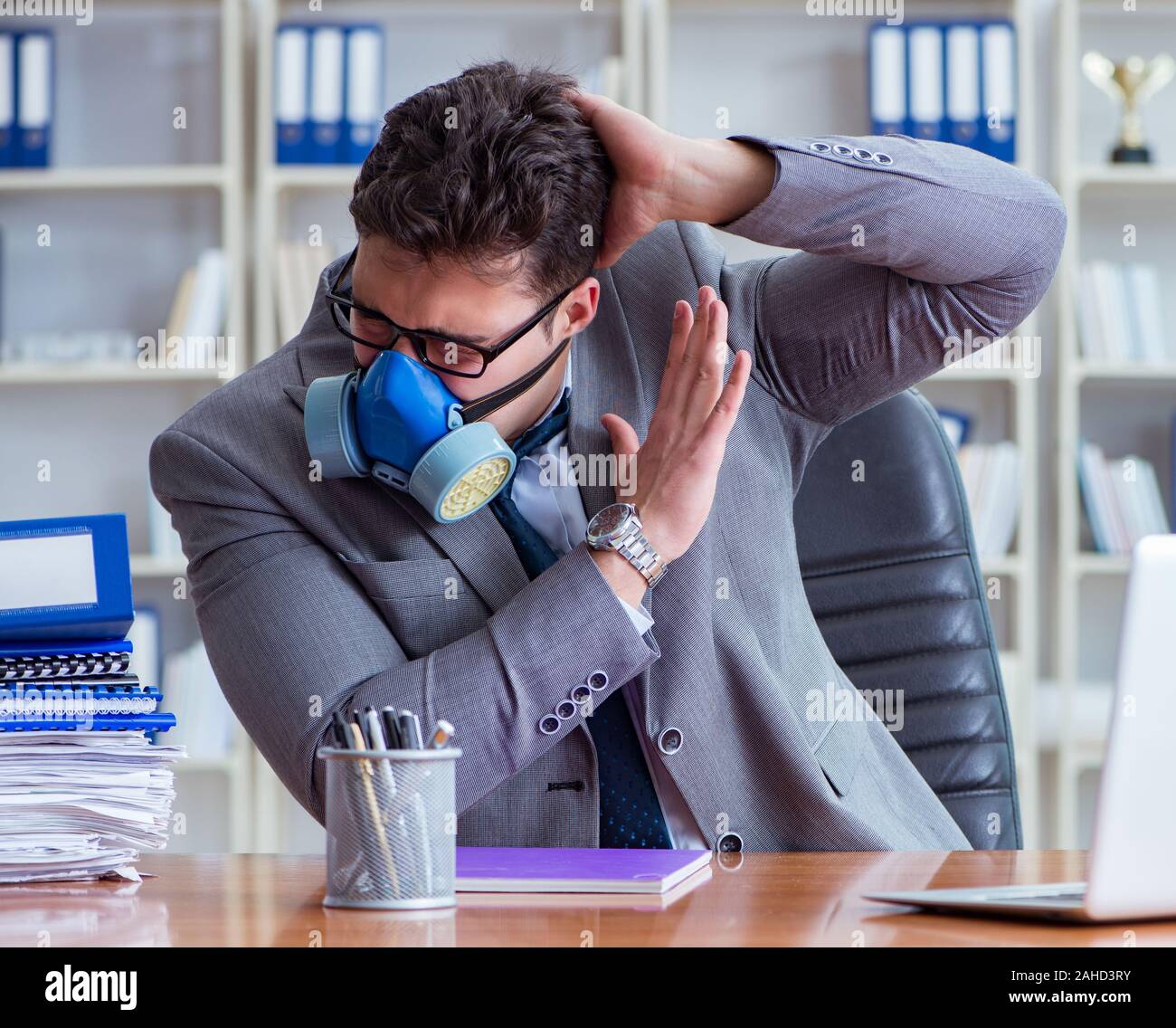 Businessman sweating excessively smelling bad in office at workplace ...