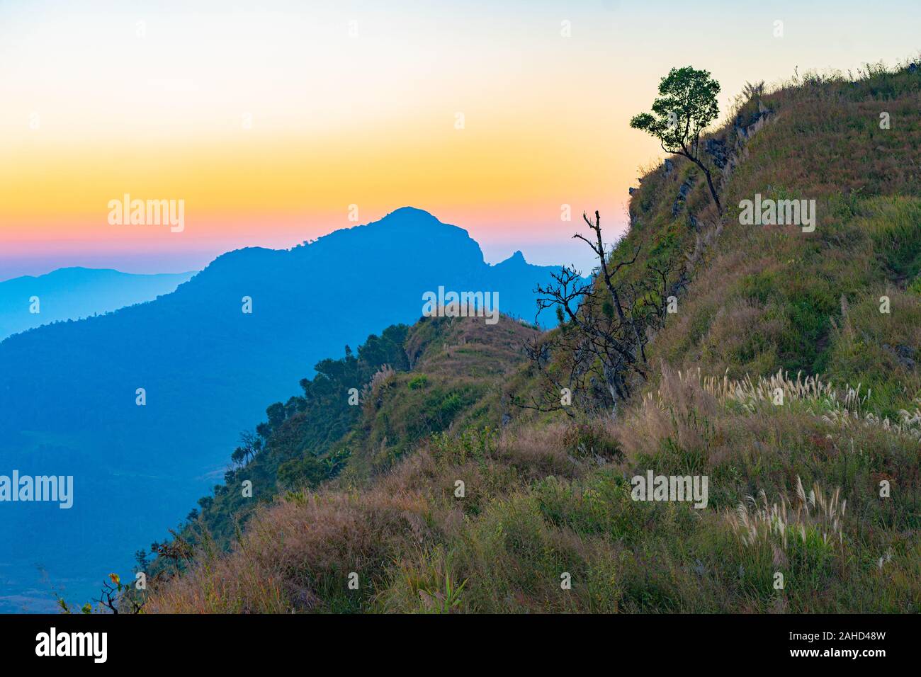 scenery sunrise above the mountain ridge on Doi Pha Phung at Nan ...