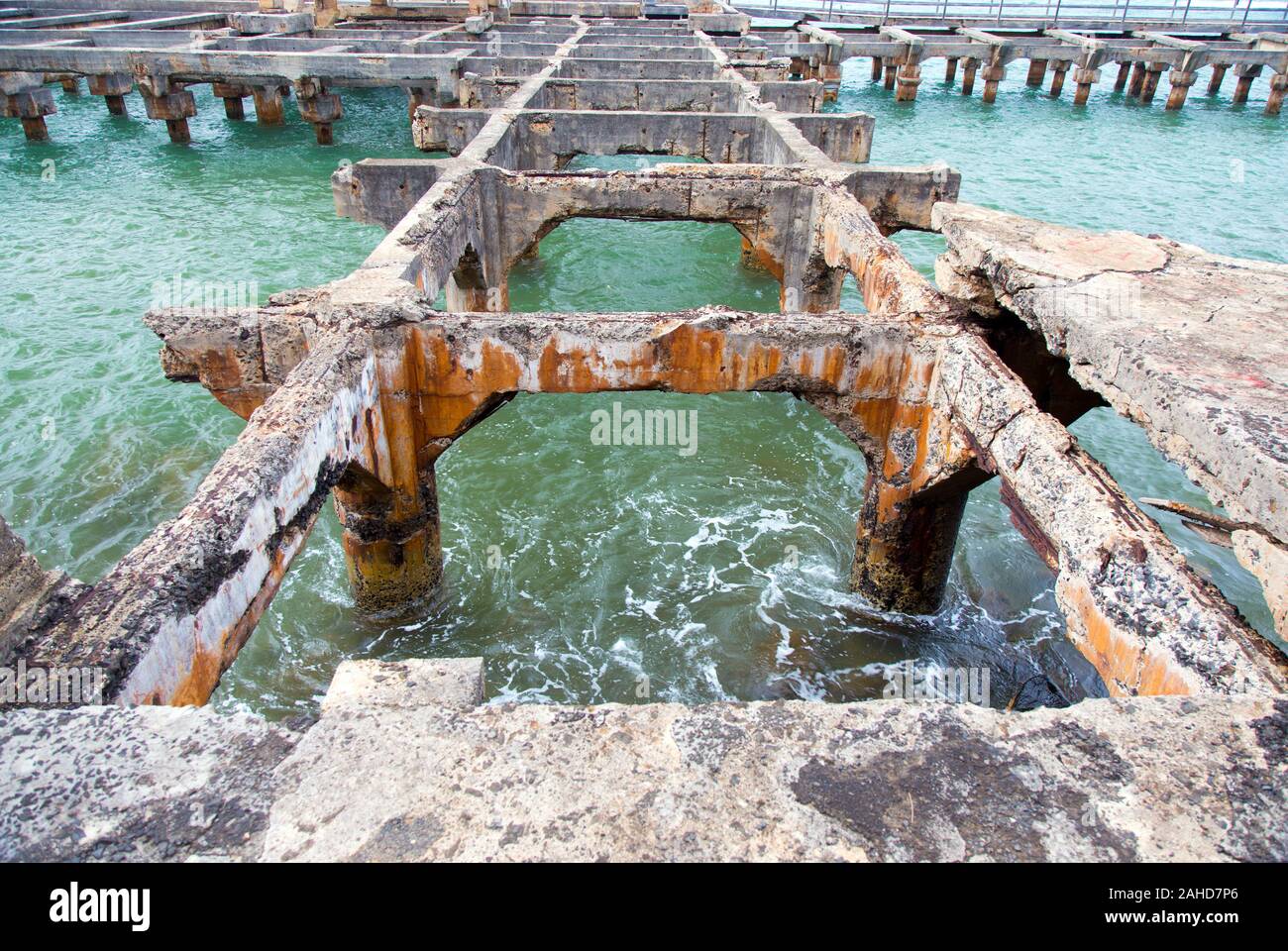 Remnants of the dock at Ahukini Landing on the island of Kauai, Hawaii ...