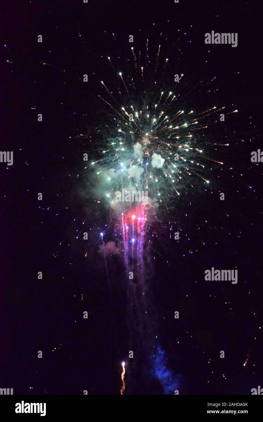 Celebration with fireworks at the night. Firecracker to celebrate a new ...