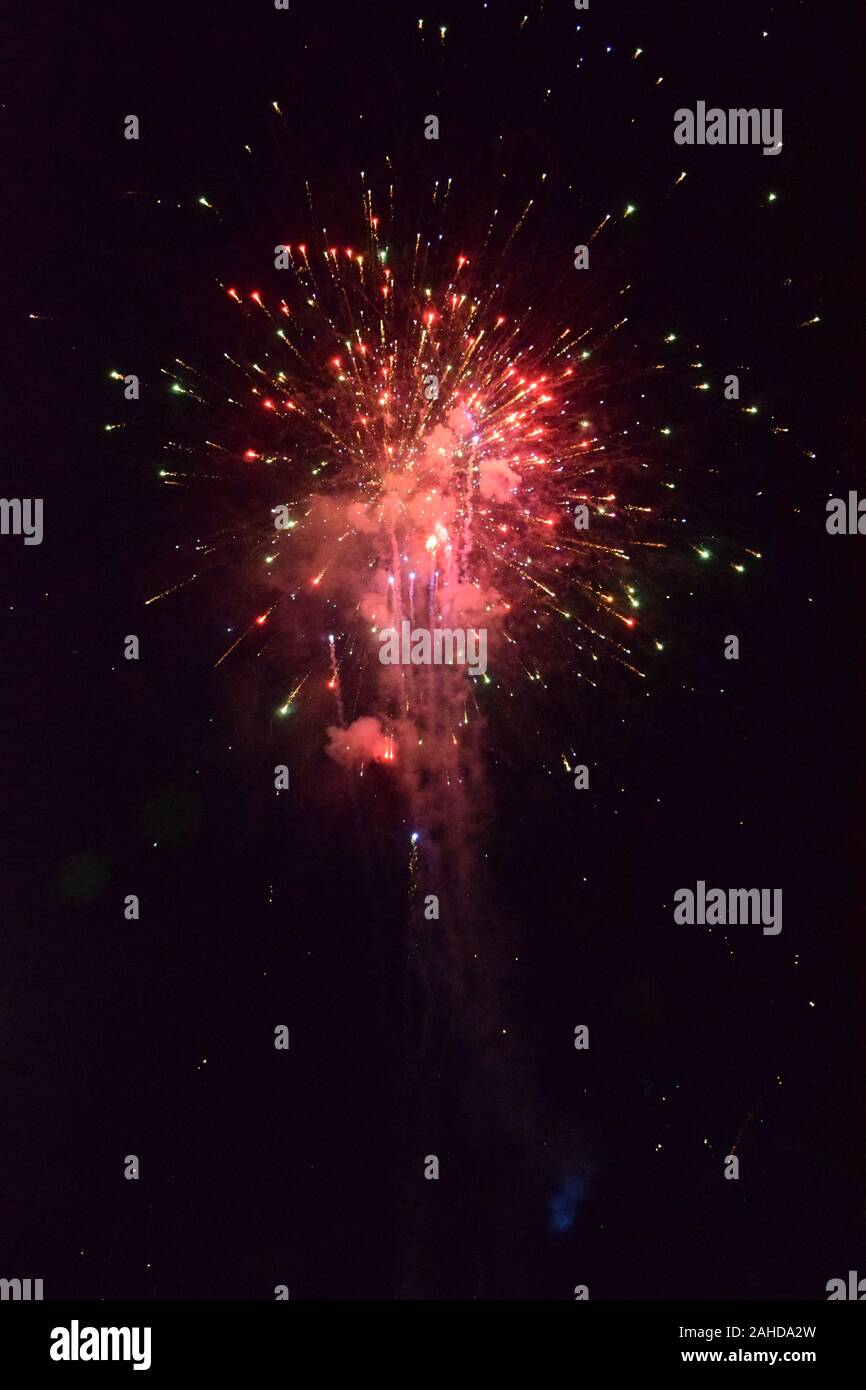 Celebration with fireworks at the night. Firecracker to celebrate a new ...