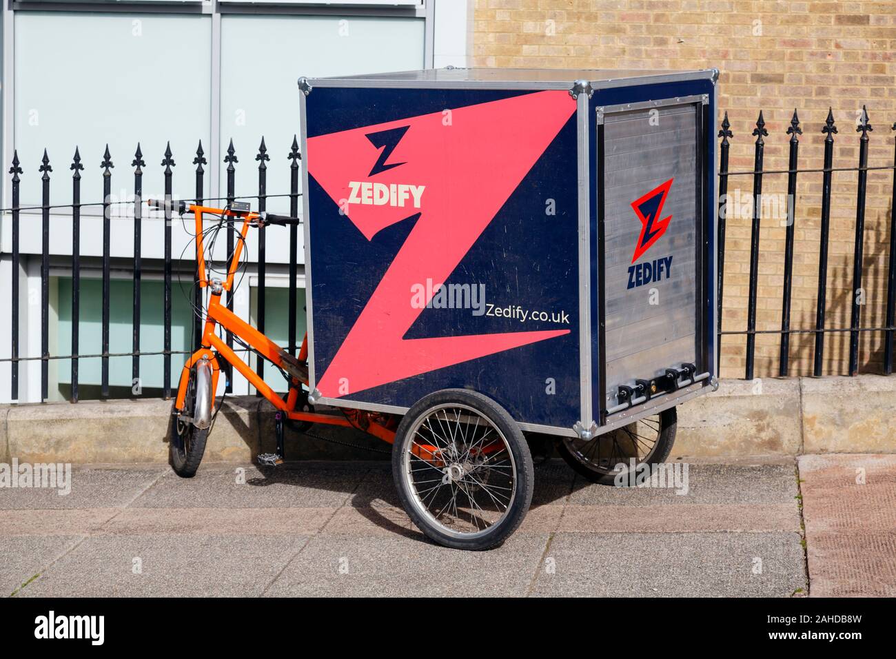 A Zedify cargo bicycle parked at the roadside in Glasgow city centre ...