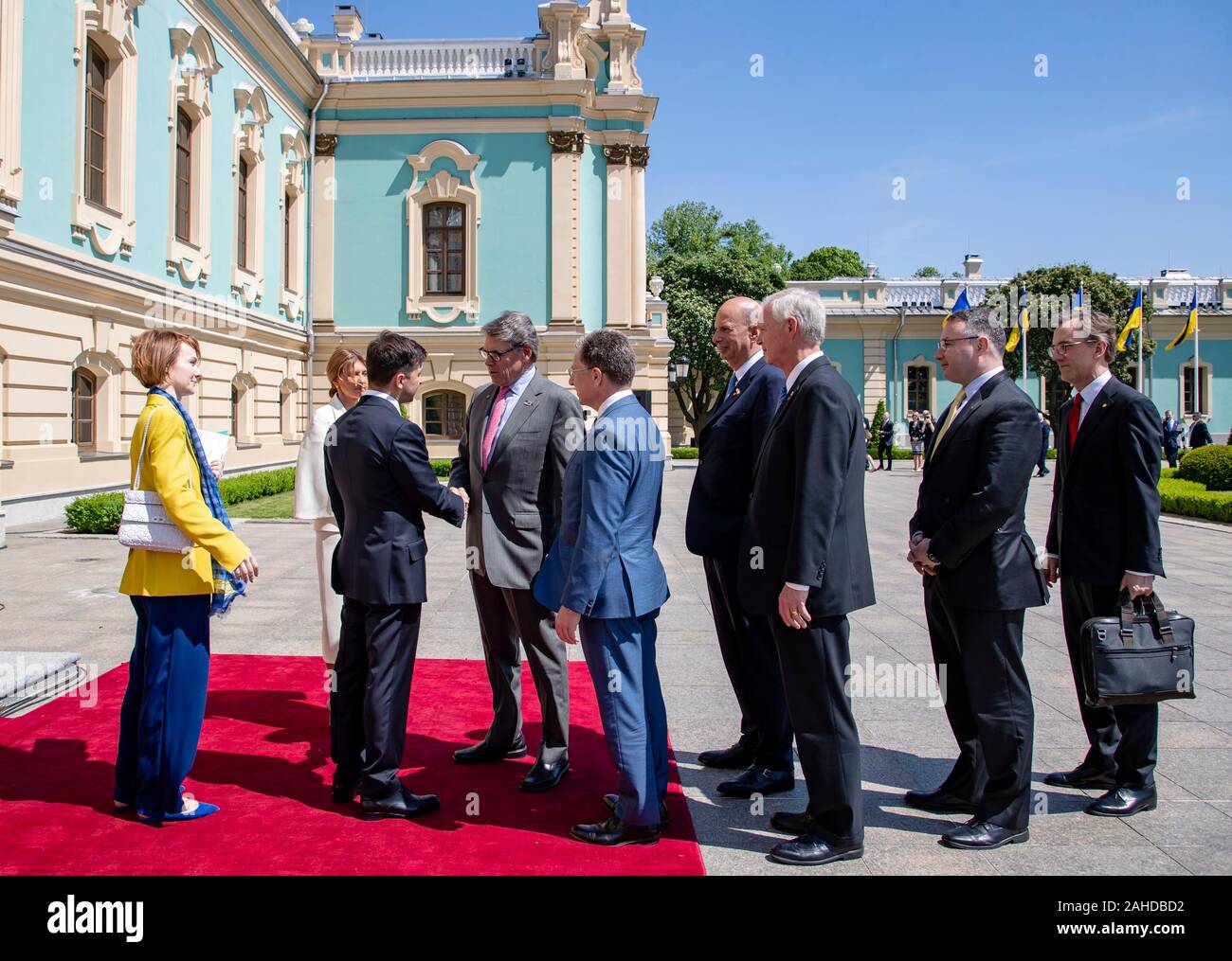 U.S. Energy Secretary Rick Perry, center, shakes hands with Ukrainian ...