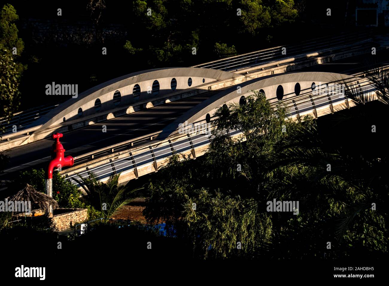 A view of the giant red tap at the Tobogán Cala Galdana restaurant in ...