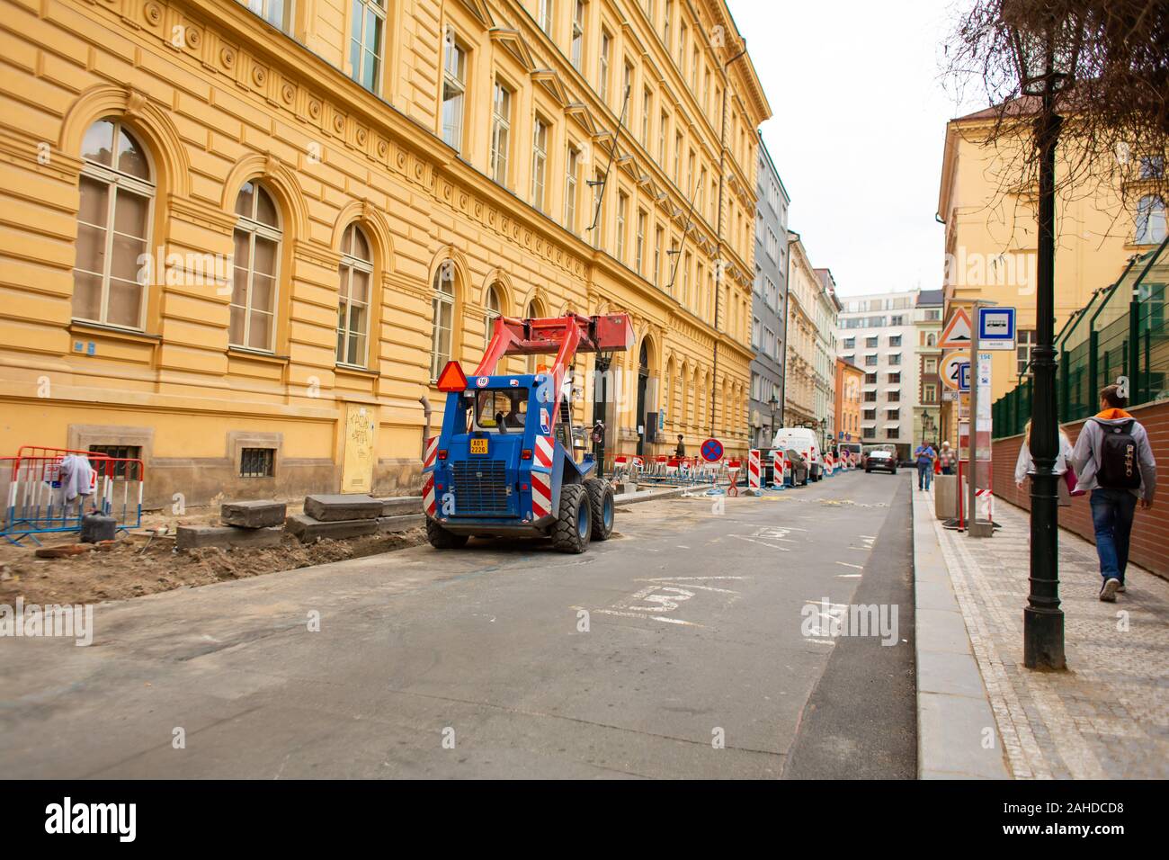 Replacement of curbs and repair of sidewalks in the old city. Workers ...