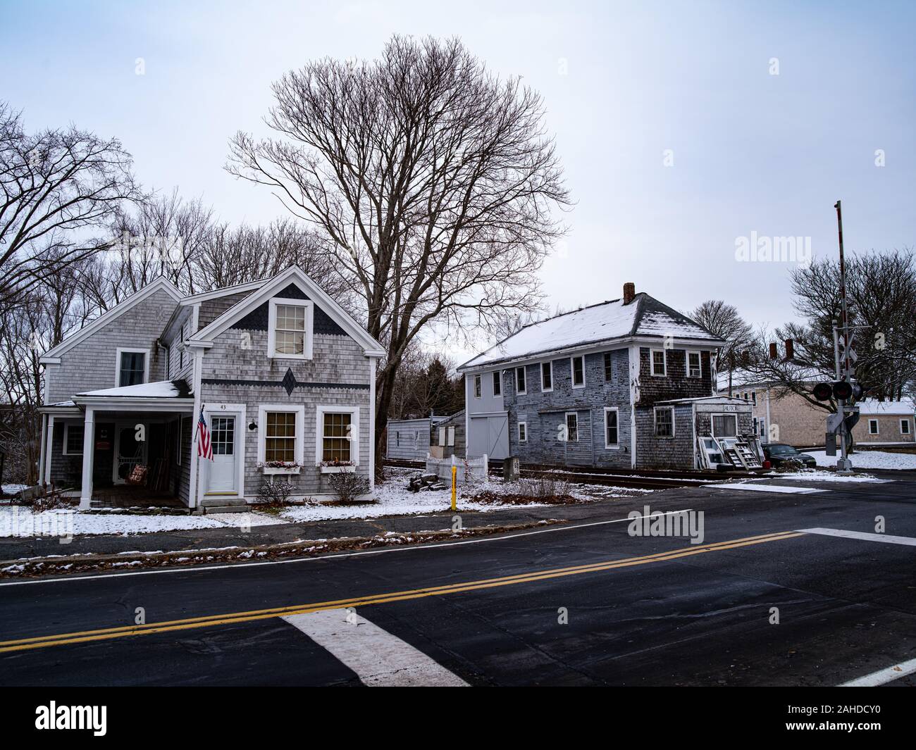 Houses Line Railroad Tracks at a Crossing Stock Photo - Alamy