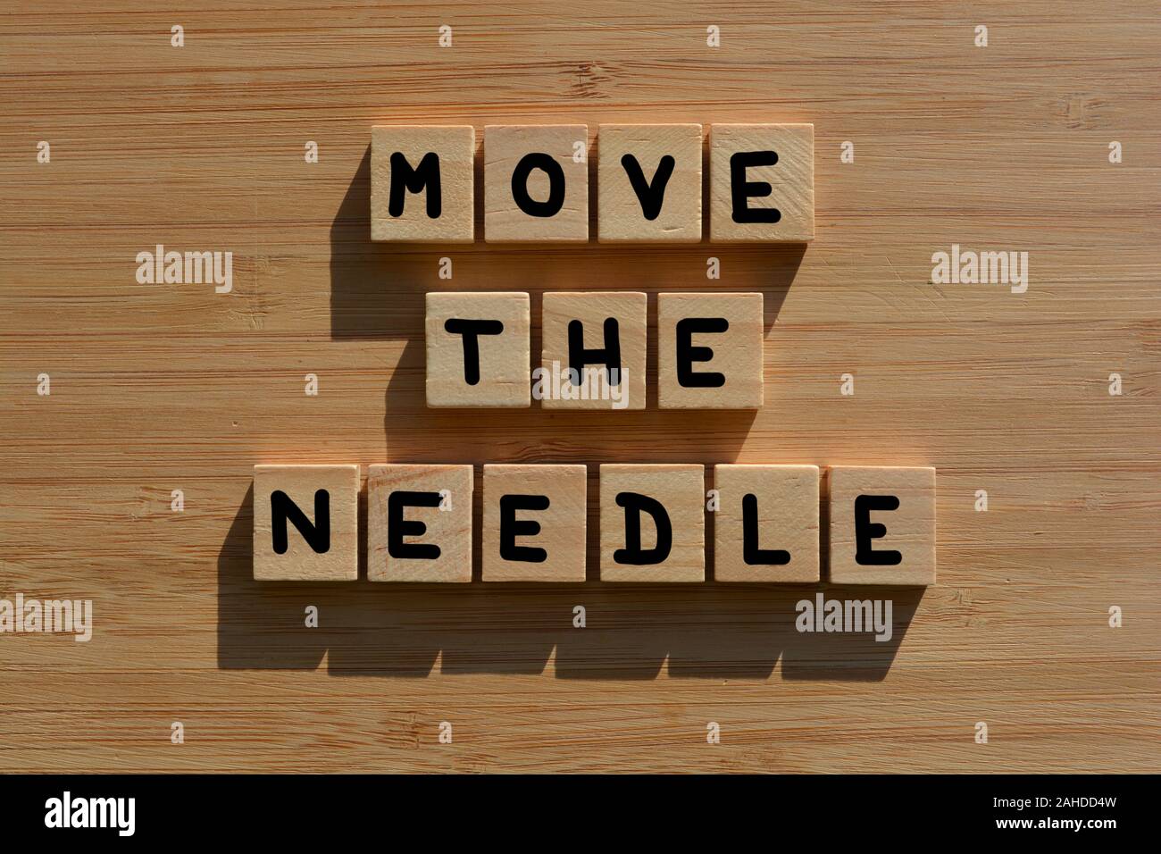 Move The Needle, business jargon, words in 3d wooden alphabet letters ...