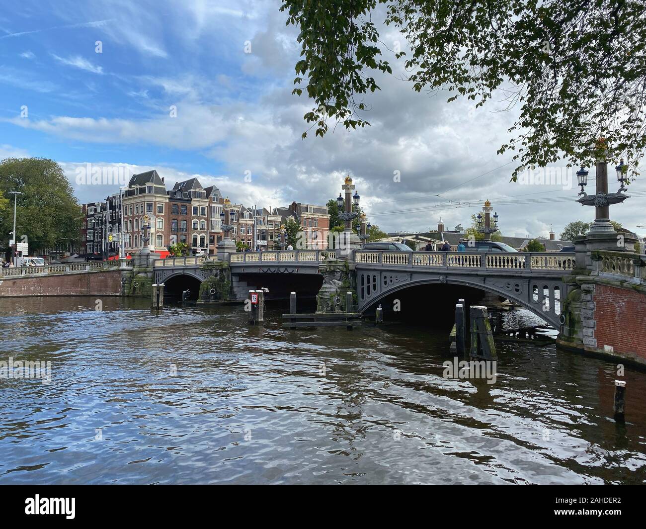 Amsterdam, Netherlands - October 2,2019: Amsterdam canal with typical ...