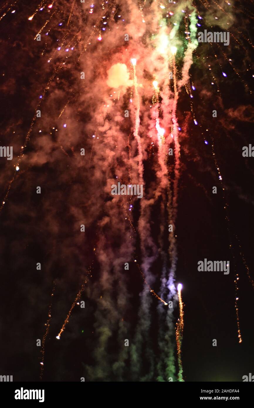Celebration with fireworks at the night. Firecracker to celebrate a new ...