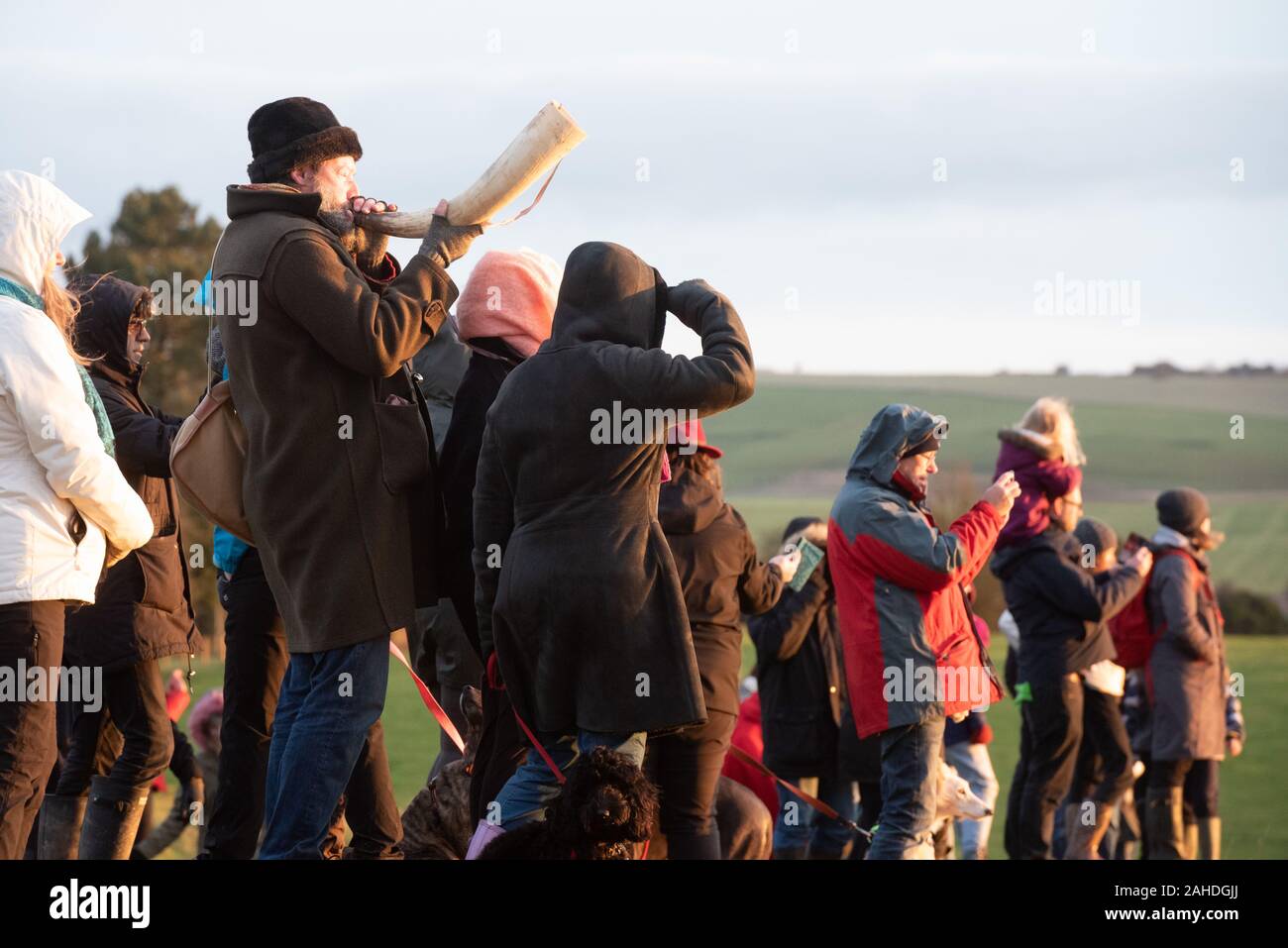 Avebury, Wiltshire, UK. 22nd December 2019. Hundreds of people gather ...