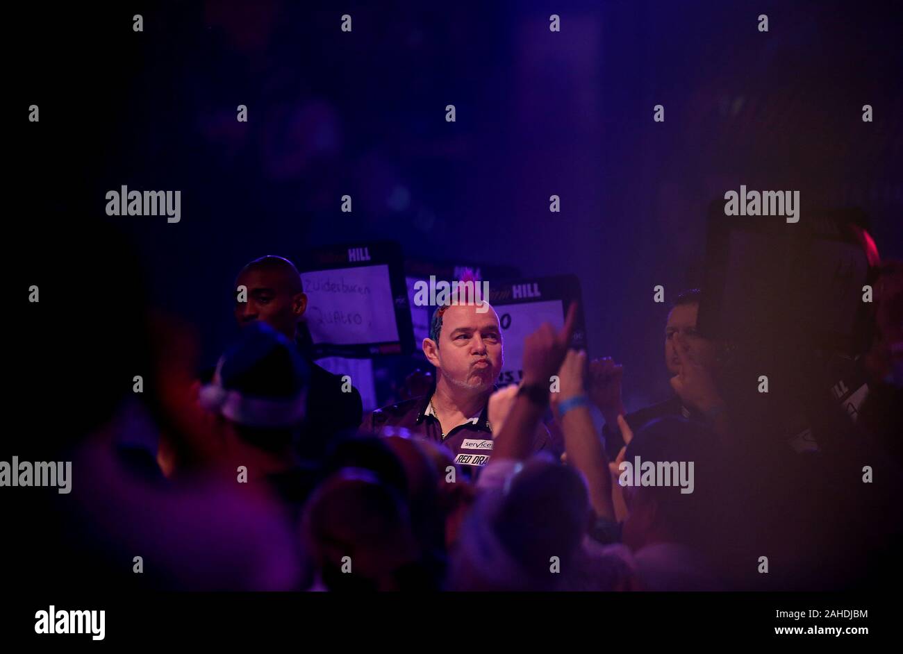 Peter Wright during the walk on during day thirteen of the William Hill ...