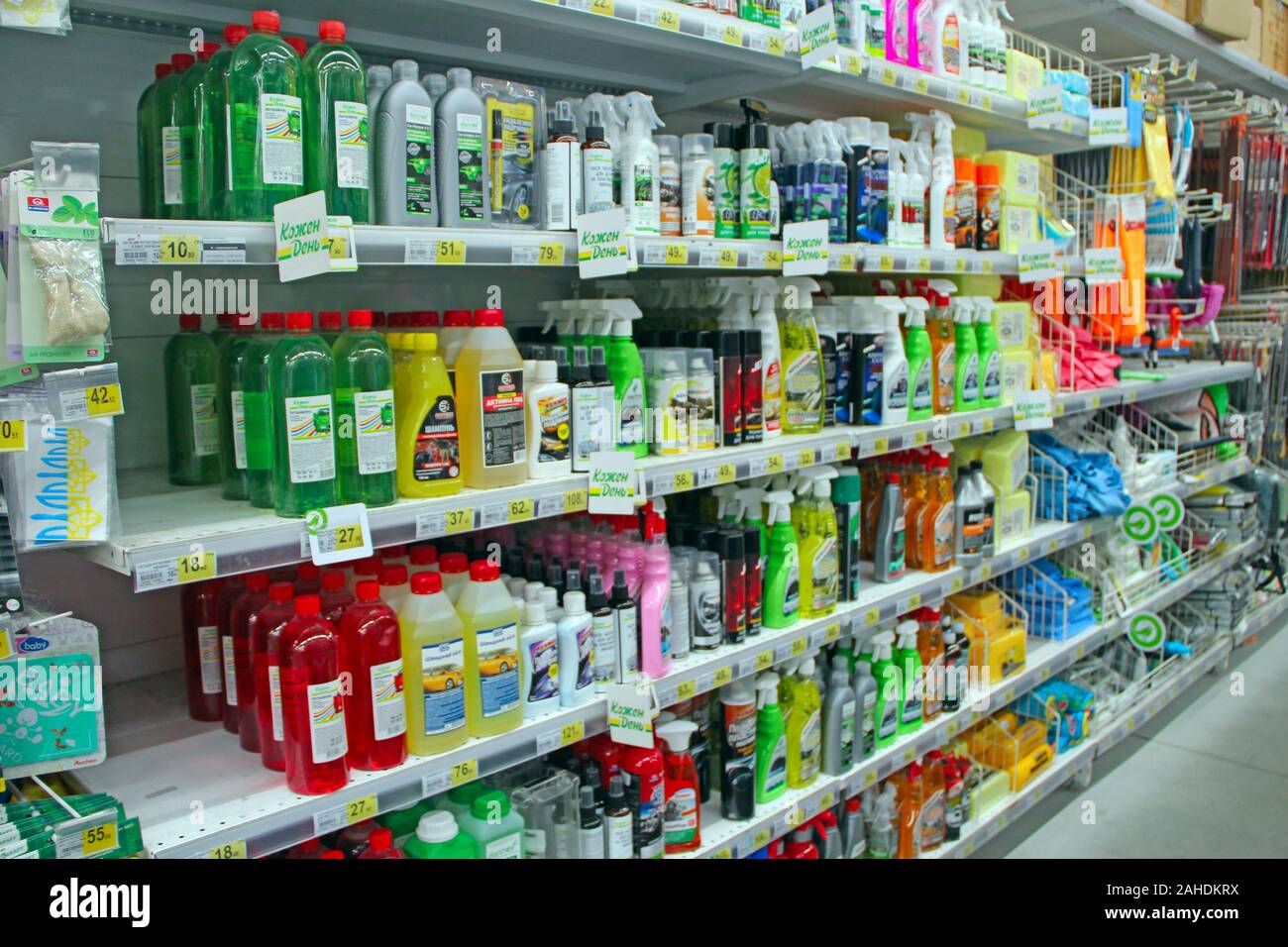 Detergents shampoo shaving foams on shelves of shop. Shop of detergents ...